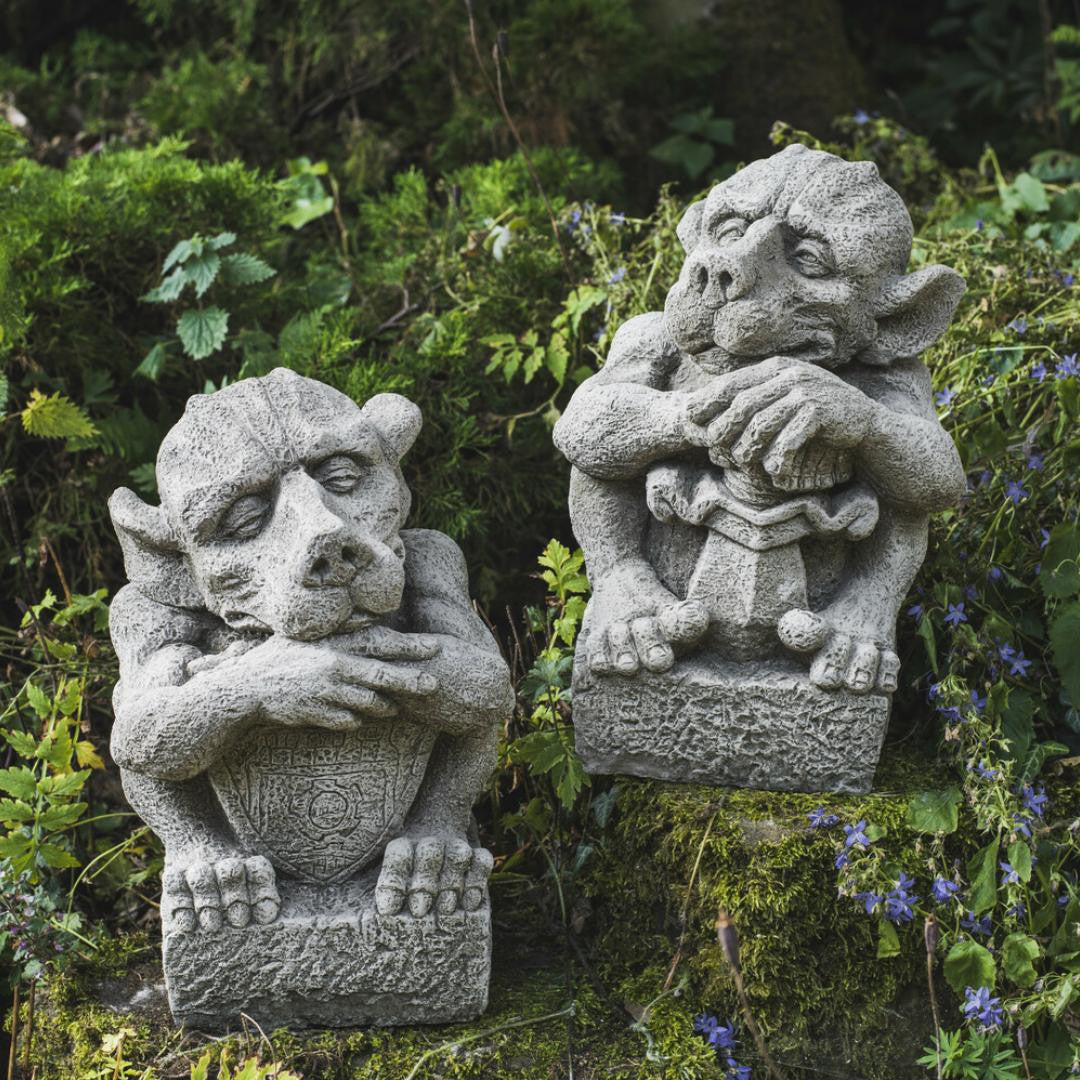 A Pair of concrete cast Sword and Shield Gargoyles – DGS Statues